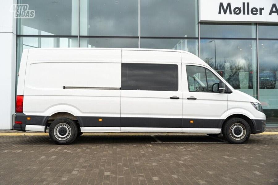White Volkswagen Crafter 2019 in Vilnius, with an engine capacity of 2.00 L and mileage of 169 thousand km for 23950 €, photo 4 on AUTOMOTO.COM.LV