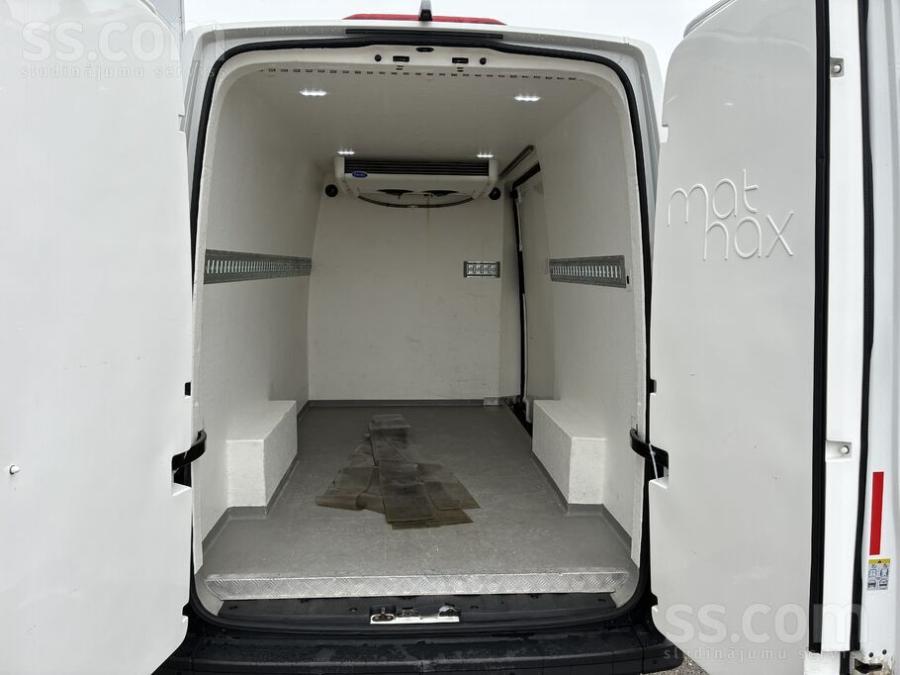 White Volkswagen Crafter 2022 in Riga, with an engine capacity of 2.00 L and mileage of 311 thousand km for 13500 €, photo 6 on AUTOMOTO.COM.LV