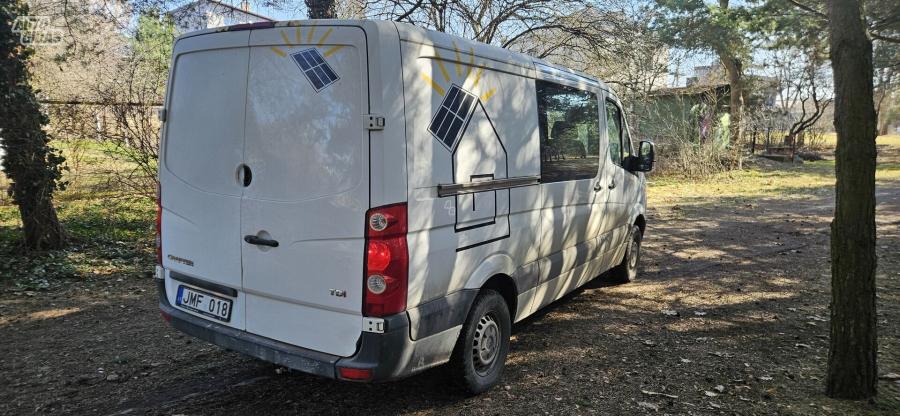 White Volkswagen Crafter 2016 in Kaunas, with an engine capacity of 2.00 L and mileage of 285 thousand km for 4950 €, photo 4 on AUTOMOTO.COM.LV