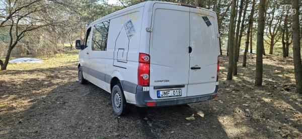 White Volkswagen Crafter 2016 in Kaunas, with an engine capacity of 2.00 L and mileage of 285 thousand km for 4950 €, photo 5 on AUTOMOTO.COM.LV