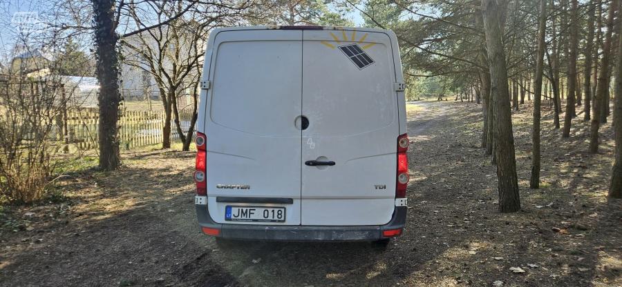 White Volkswagen Crafter 2016 in Kaunas, with an engine capacity of 2.00 L and mileage of 285 thousand km for 4950 €, photo 6 on AUTOMOTO.COM.LV