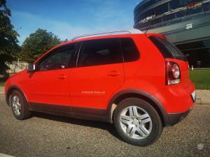 Red Volkswagen cross-polo 2009 in Vilnius, with an engine capacity of 1.40 L and mileage of 196 thousand km for 2690 €, photo  on AUTOMOTO.COM.LV