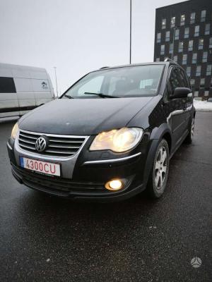 Black Volkswagen cross-touran 2008 in Kaunas, with an engine capacity of 2.00 L and mileage of 348 thousand km for 2850 €, photo  on AUTOMOTO.COM.LV