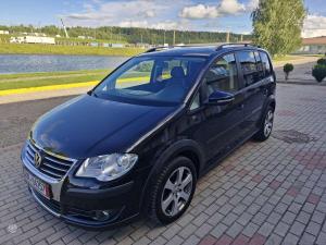 Black Volkswagen cross-touran 2009 in Vilnius, with an engine capacity of 1.40 L and mileage of 227 thousand km for 4150 €, photo  on AUTOMOTO.COM.LV