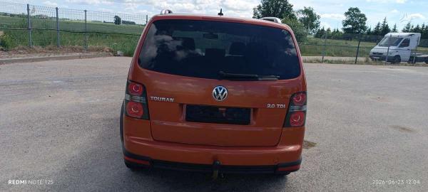 Orange Volkswagen cross-touran 2009 in Marijampole, with an engine capacity of 2.00 L and mileage of 289 thousand km for 3350 €, photo 5 on AUTOMOTO.COM.LV