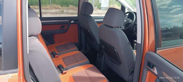 Orange Volkswagen cross-touran 2009 in Marijampole, with an engine capacity of 2.00 L and mileage of 289 thousand km for 3350 €, photo 10 on AUTOMOTO.COM.LV