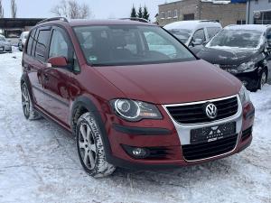 Sarkans Volkswagen cross-touran 2009 Kretinga, ar dzinēja tilpumu 1.40 L un nobraukumu 205 tūkst. km par 4500 €, foto  vietnē AUTOMOTO.COM.LV