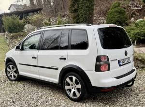 White Volkswagen cross-touran 2008 in Vilnius, with an engine capacity of 1.90 L and mileage of 400 thousand km for 3290 €, photo  on AUTOMOTO.COM.LV