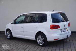 White Volkswagen cross-touran 2012 in Kedainiai, with an engine capacity of 2.00 L and mileage of 248 thousand km for 5450 €, photo 4 on AUTOMOTO.COM.LV