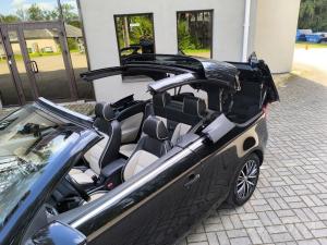 Black Volkswagen Eos 2008 in Valmiera, with an engine capacity of 2.00 L and mileage of 260 thousand km for 5650 €, photo 11 on AUTOMOTO.COM.LV