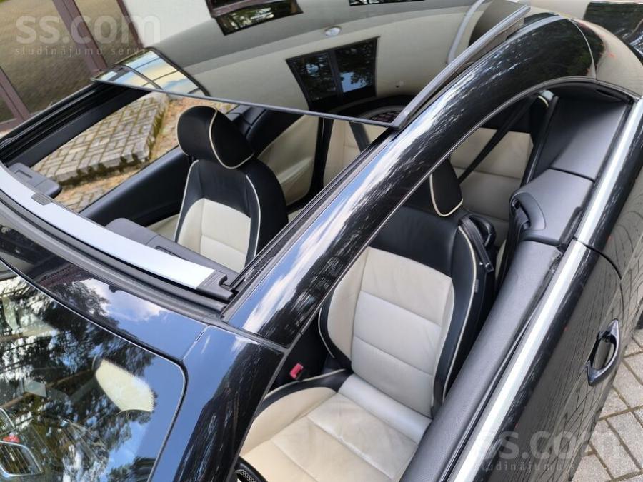 Black Volkswagen Eos 2008 in Valmiera, with an engine capacity of 2.00 L and mileage of 260 thousand km for 5650 €, photo 12 on AUTOMOTO.COM.LV