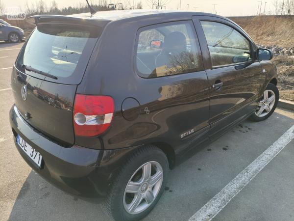 Black Volkswagen Fox 2010 in Vilnius, with an engine capacity of 1.20 L and mileage of 123 thousand km for 650 €, photo 5 on AUTOMOTO.COM.LV