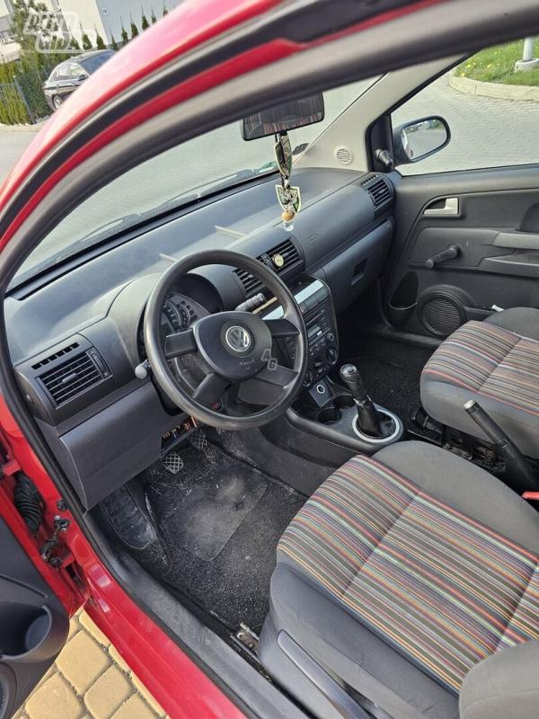 Red Volkswagen Fox 2005 in Kaunas, with an engine capacity of 1.20 L and mileage of 195 thousand km for 500 €, photo 8 on AUTOMOTO.COM.LV