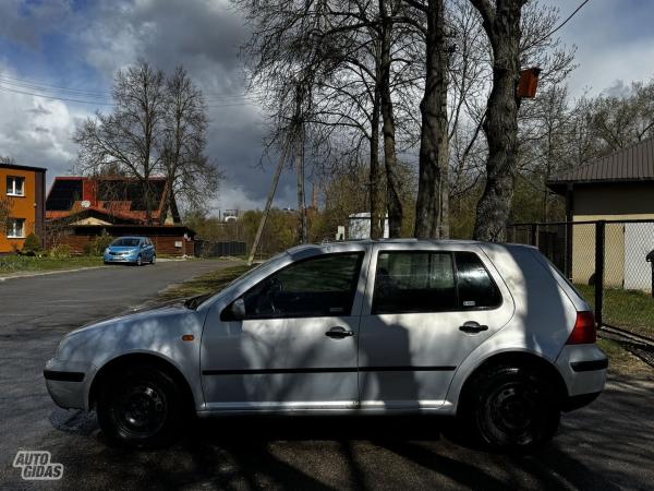 Grey Volkswagen Golf 1998 in Panevezys, with an engine capacity of 1.40 L and mileage of 241 thousand km for 555 €, photo 5 on AUTOMOTO.COM.LV