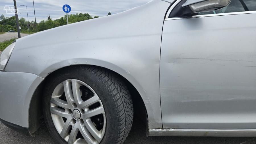 Grey Volkswagen Golf 2008 in Kaunas, with an engine capacity of 1.90 L and mileage of 370 thousand km for 799 €, photo 12 on AUTOMOTO.COM.LV
