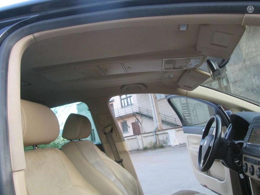 Black Volkswagen Golf Plus 2006 in Kelme, with an engine capacity of 1.97 L and mileage of 267 thousand km for 1950 €, photo 14 on AUTOMOTO.COM.LV