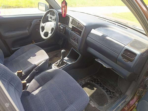 Sarkans Volkswagen Golf 1994 Kaišiadorys, ar dzinēja tilpumu 1.80 L un nobraukumu 176 tūkst. km par 450 €, foto 8 vietnē AUTOMOTO.COM.LV