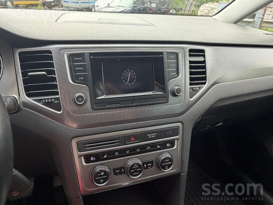 Grey Volkswagen Golf Sportsvan 2015 in Ludza, with an engine capacity of 1.60 L and mileage of 228 thousand km for 7450 €, photo 12 on AUTOMOTO.COM.LV