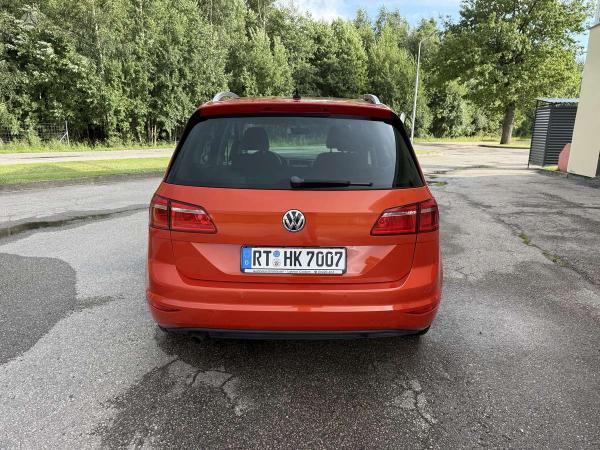 Orange Volkswagen Golf Sportsvan 2015 in Panevezys, with an engine capacity of 1.60 L and mileage of 232 thousand km for 6600 €, photo 9 on AUTOMOTO.COM.LV