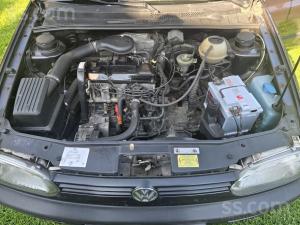 Violet Volkswagen Golf 1994 in Riga, with an engine capacity of 1.80 L and mileage of 192 thousand km for 1400 €, photo 4 on AUTOMOTO.COM.LV
