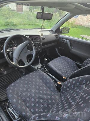 Violet Volkswagen Golf 1994 in Riga, with an engine capacity of 1.80 L and mileage of 192 thousand km for 1400 €, photo 6 on AUTOMOTO.COM.LV