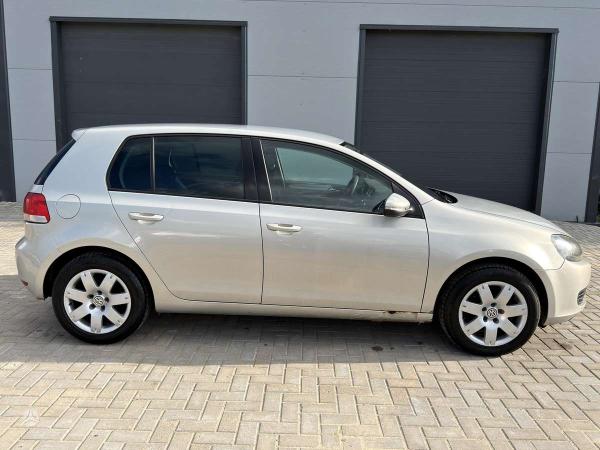Yellow Volkswagen Golf 2012 in Vilnius, with an engine capacity of 1.40 L and mileage of 235 thousand km for 1450 €, photo 7 on AUTOMOTO.COM.LV