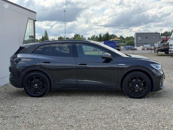 Black Volkswagen ID.4 2022 in Siauliai, with an engine capacity of 0.00 L and mileage of 69 thousand km for 25499 €, photo 4 on AUTOMOTO.COM.LV