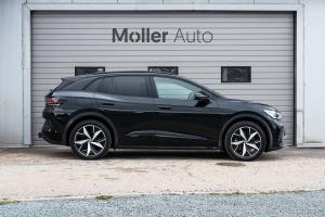 Black Volkswagen ID.4 2023 in Jelgava, with an engine capacity of 0.00 L and mileage of 91 thousand km for 33950 €, photo 6 on AUTOMOTO.COM.LV