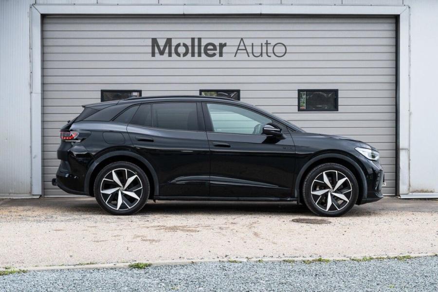 Black Volkswagen ID.4 2023 in Jelgava, with an engine capacity of 0.00 L and mileage of 91 thousand km for 33950 €, photo 6 on AUTOMOTO.COM.LV