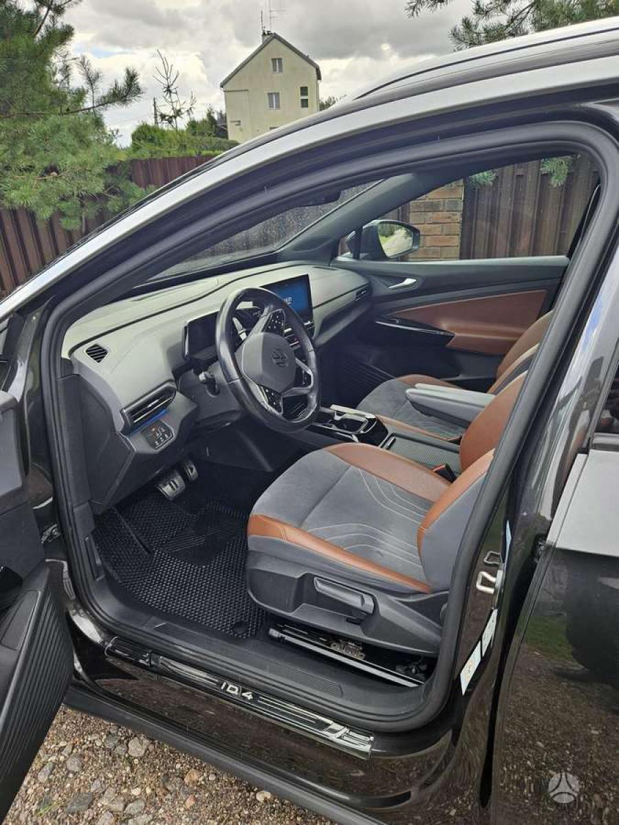 Black Volkswagen ID.4 2021 in Vilnius, with an engine capacity of 0.00 L and mileage of 136 thousand km for 23800 €, photo 7 on AUTOMOTO.COM.LV
