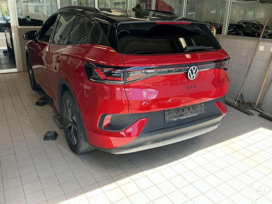 Red Volkswagen ID.4 2022 in Vilnius, with an engine capacity of 0.00 L and mileage of 104 thousand km for 27990 €, photo 4 on AUTOMOTO.COM.LV