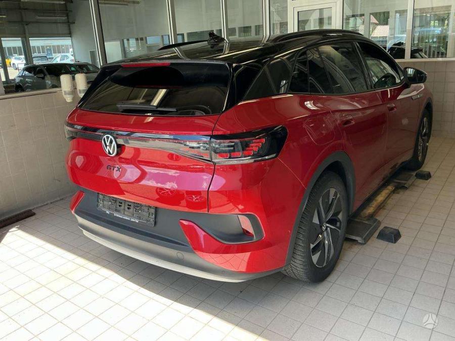 Red Volkswagen ID.4 2022 in Vilnius, with an engine capacity of 0.00 L and mileage of 104 thousand km for 27990 €, photo 5 on AUTOMOTO.COM.LV