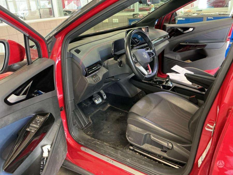Red Volkswagen ID.4 2022 in Vilnius, with an engine capacity of 0.00 L and mileage of 104 thousand km for 27990 €, photo 7 on AUTOMOTO.COM.LV
