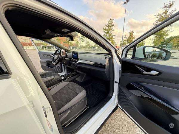 Фольксваген ID.4 2023 в Клайпеда на AUTOMOTO.COM.LV Белый Фольксваген ID.4 2023 в Клайпеда, объемом двигателя 0.00 л и пробегом 60 тыс. км за 30500 €, фото 11 на AUTOMOTO.COM.LV