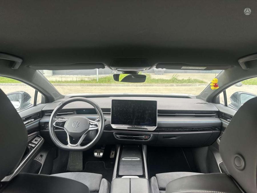 White Volkswagen ID.7 2024 in Vilnius, with an engine capacity of 0.00 L and mileage of 88 thousand km for 36100 €, photo 15 on AUTOMOTO.COM.LV