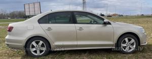 Smilšu krāsa Volkswagen Jetta 2016 Tartu, ar dzinēja tilpumu 1.40 L un nobraukumu 141 tūkst. km par 6900 €, foto 4 vietnē AUTOMOTO.COM.LV