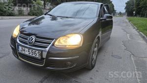 Black Volkswagen Jetta 2006 in Riga, with an engine capacity of 1.60 L and mileage of 249 thousand km for 1100 €, photo 8 on AUTOMOTO.COM.LV