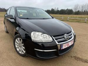 Black Volkswagen Jetta 2008 in Utena, with an engine capacity of 1.90 L and mileage of 171 thousand km for 2999 €, photo 4 on AUTOMOTO.COM.LV