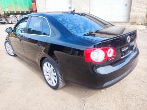 Black Volkswagen Jetta 2009 in Utena, with an engine capacity of 1.97 L and mileage of 246 thousand km for 2750 €, photo 4 on AUTOMOTO.COM.LV