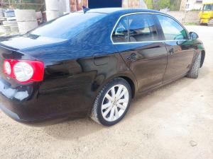 Black Volkswagen Jetta 2009 in Utena, with an engine capacity of 1.97 L and mileage of 246 thousand km for 2750 €, photo 6 on AUTOMOTO.COM.LV