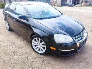 Black Volkswagen Jetta 2009 in Utena, with an engine capacity of 1.97 L and mileage of 246 thousand km for 2750 €, photo 9 on AUTOMOTO.COM.LV