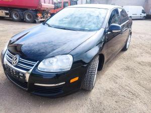 Black Volkswagen Jetta 2009 in Utena, with an engine capacity of 1.97 L and mileage of 246 thousand km for 2750 €, photo 15 on AUTOMOTO.COM.LV