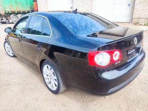 Black Volkswagen Jetta 2009 in Utena, with an engine capacity of 1.97 L and mileage of 246 thousand km for 2750 €, photo 18 on AUTOMOTO.COM.LV