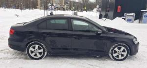 Black Volkswagen Jetta 2012 in Kaunas, with an engine capacity of 1.60 L and mileage of 278 thousand km for 4999 €, photo 4 on AUTOMOTO.COM.LV