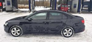 Black Volkswagen Jetta 2012 in Kaunas, with an engine capacity of 1.60 L and mileage of 278 thousand km for 4999 €, photo 8 on AUTOMOTO.COM.LV
