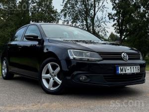 Melns Volkswagen Jetta 2012 Tukums, ar dzinēja tilpumu 1.40 L un nobraukumu 156 tūkst. km par 4650 €, foto 4 vietnē AUTOMOTO.COM.LV