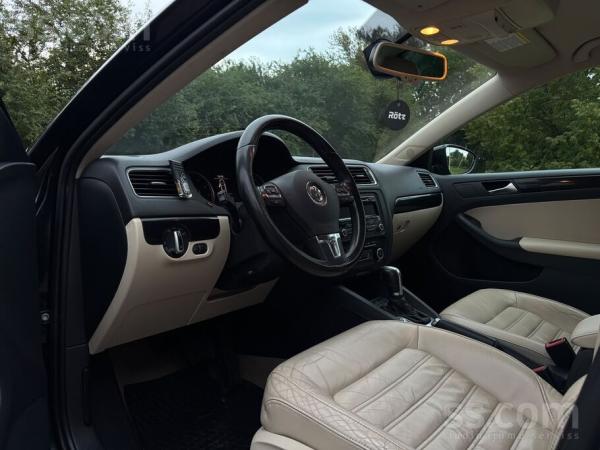 Melns Volkswagen Jetta 2012 Tukums, ar dzinēja tilpumu 1.40 L un nobraukumu 156 tūkst. km par 4650 €, foto 10 vietnē AUTOMOTO.COM.LV