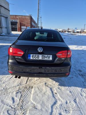 Black Volkswagen Jetta 2013 in Tallinn, with an engine capacity of 1.40 L and mileage of 235 thousand km for 5400 €, photo 9 on AUTOMOTO.COM.LV