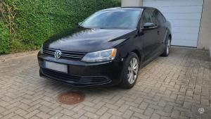 Black Volkswagen Jetta 2013 in Kaunas, with an engine capacity of 1.98 L and mileage of 202 thousand km for 3500 €, photo  on AUTOMOTO.COM.LV