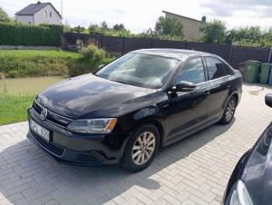 Black Volkswagen Jetta 2014 in Kaunas, with an engine capacity of 1.40 L and mileage of 250 thousand km for 5400 €, photo 3 on AUTOMOTO.COM.LV
